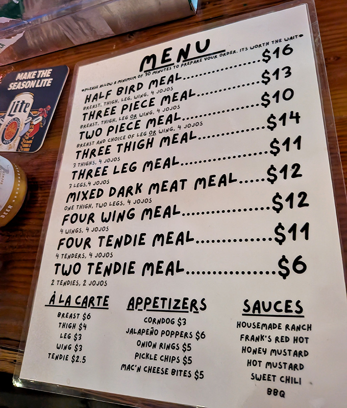 The handwritten menu speaks volumes: no fancy descriptions needed when your chicken has achieved legendary status. "It's worth the wait" isn't a warning&mdash;it's a promise.