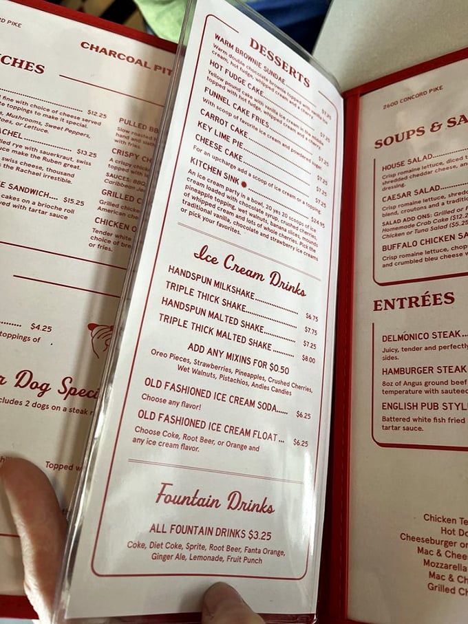 The menu reads like poetry to comfort food enthusiasts—triple-thick milkshakes, handcrafted burgers, and desserts that wouldn't dare call themselves "deconstructed."
