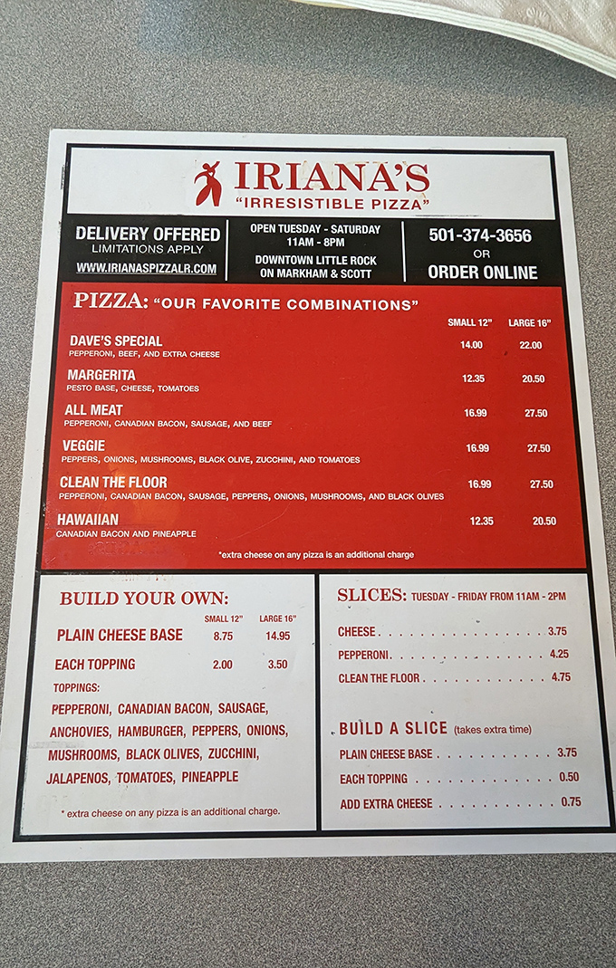 The menu board tells the whole story—straightforward options with playful names like "Clean the Floor" that promise pizza perfection without pretension.