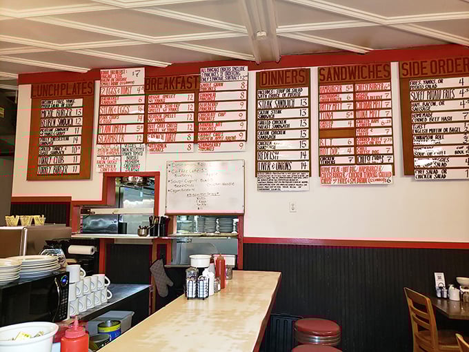 The menu board at Mickie's is a masterpiece of practical art—handwritten with the care of someone who knows these offerings are part of Madison's cultural heritage.