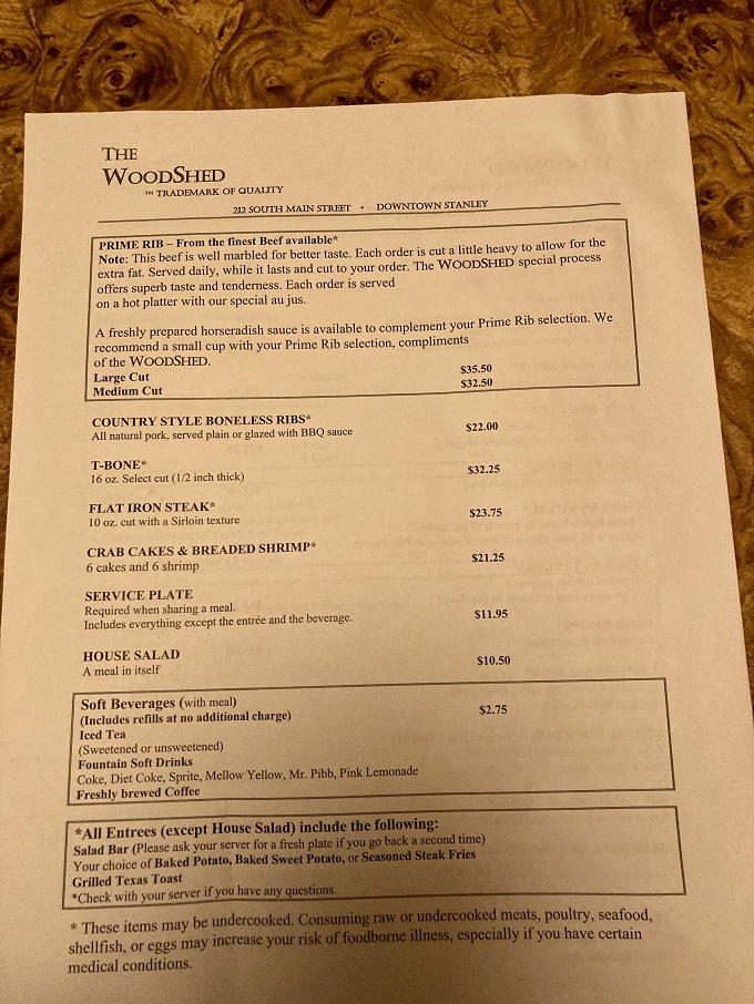 The menu doesn't mince words - this prime rib is "from the finest Beef available," a straightforward promise The WoodShed has kept for decades.