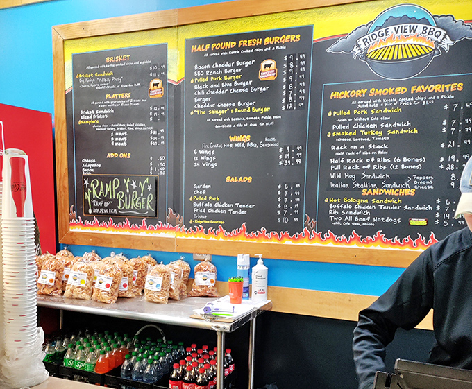 This menu board isn't just listing food options&mdash;it's offering life choices. The flame decorations aren't just for show; they're a warning of the flavor explosion to come.