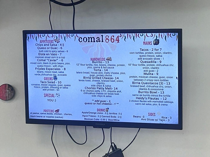 The menu board reads like a love letter to New Mexican cuisine&mdash;each item a promise of green chili bliss.