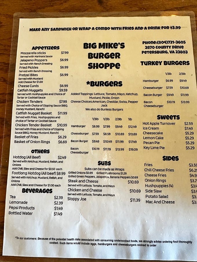 The menu tells you everything you need to know: burgers come in weights, not adjectives. Democracy in beef form.