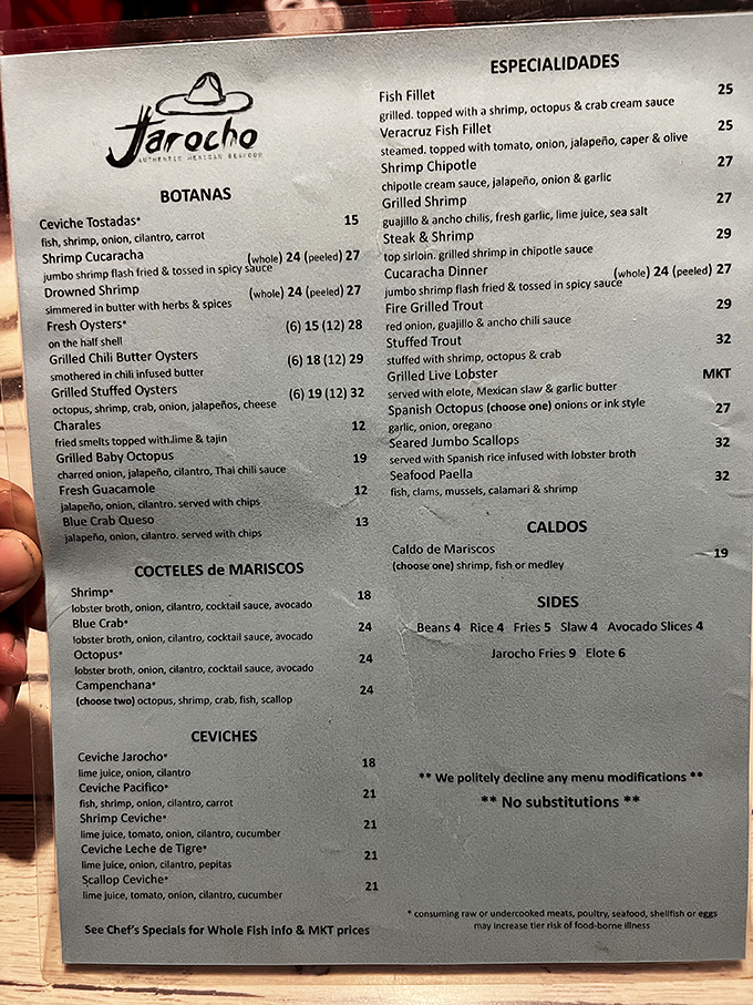 This menu isn't just a list—it's a maritime treasure map. The "we politely decline modifications" note tells you they know exactly what they're doing.