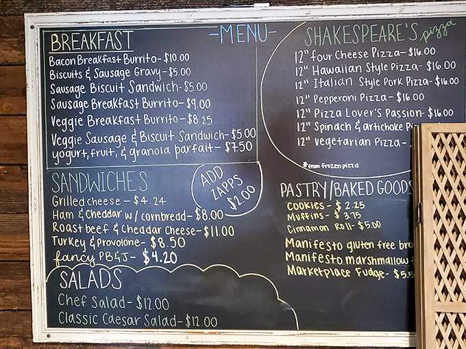 This chalkboard menu is a roadmap to happiness. Notice how they've respectfully nodded to Shakespeare's Pizza with their sauce&mdash;a true local touch!