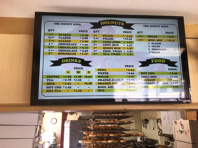 The menu board tells a simple story: life is better with donuts. And at these prices, you might as well try them all.