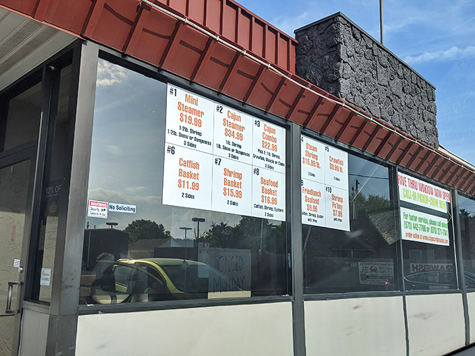 Menu boards tell the straightforward story: no fancy fonts needed when offering treasures from the deep at prices that won't sink your wallet.