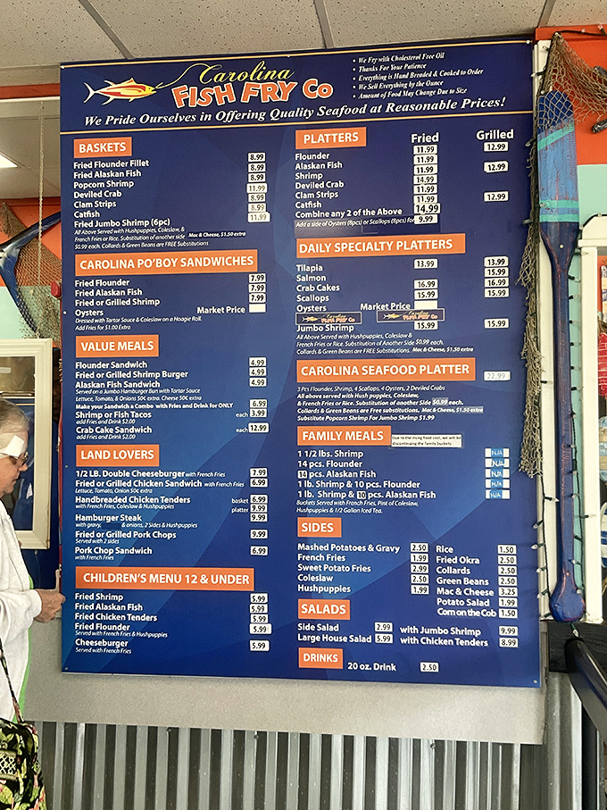 The menu board speaks the universal language of seafood lovers: fried flounder, deviled crab, and po'boys that would make New Orleans nod in respect.
