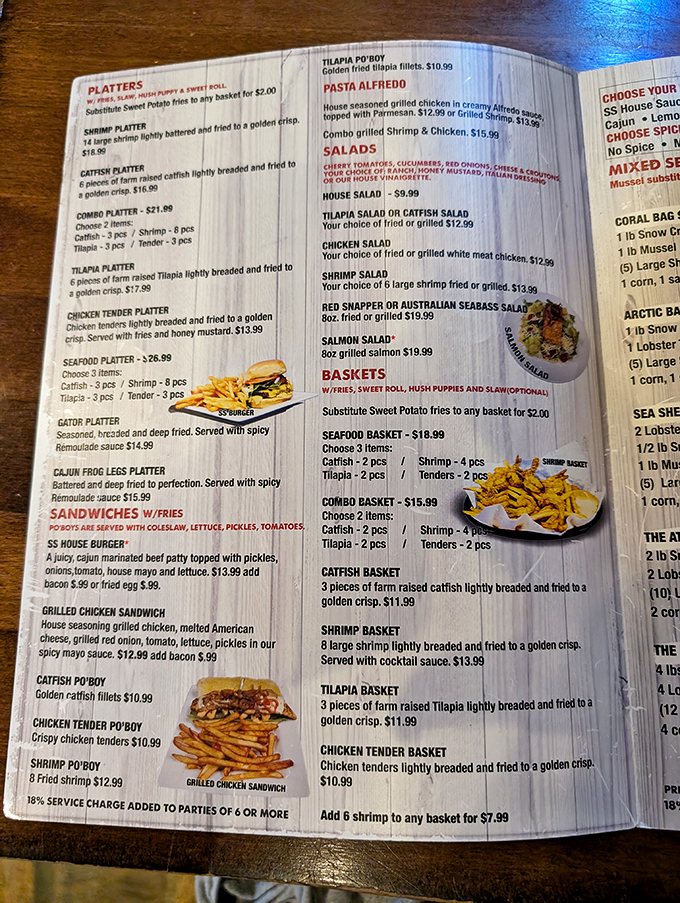 A menu that reads like a love letter to seafood lovers. Notice the Gator Platter? That's not something you find at your average chain restaurant, folks.