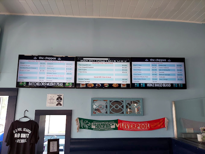 The menu board tells a story of British classics that have crossed the pond, from beer-battered cod to Heinz baked beans &ndash; comfort food diplomacy at its finest.