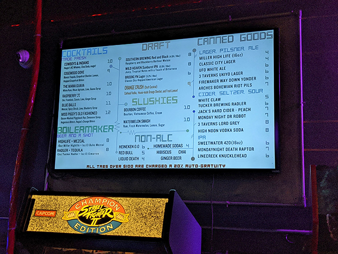 The digital menu board glows with tempting concoctions like "The Mamushka" and "Boilermaker" – each drink a power-up for your evening.