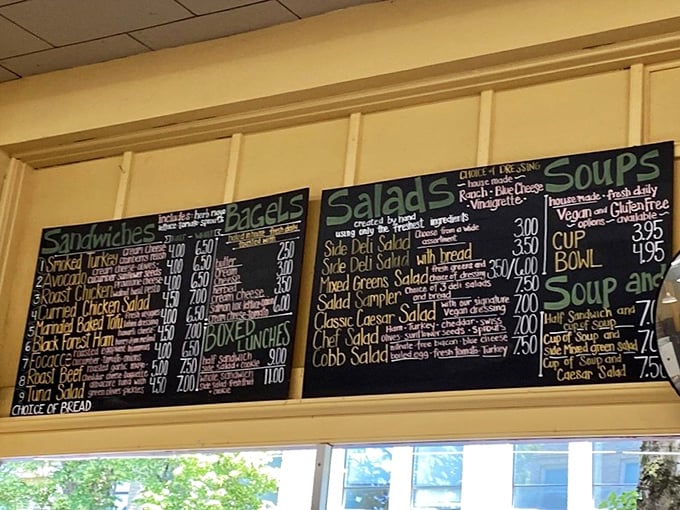 A breakfast hash scramble that's worth getting out of bed for &ndash; eggs, fresh spinach, and potatoes sharing a plate with a bright orange slice.