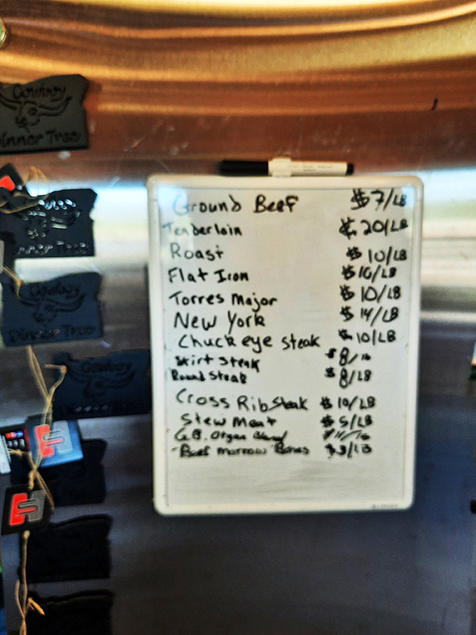No fancy QR codes here&mdash;just honest meat prices scrawled by hand. This menu board is the roadmap to carnivorous bliss.
