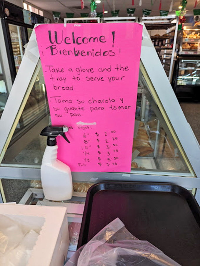The pink welcome sign says it all&mdash;grab a tray, don a glove, and embark on a self-guided tour of pastry paradise.