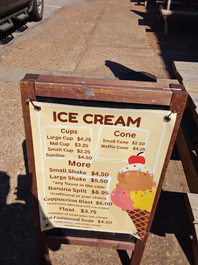 This simple wooden sign might as well be the Rosetta Stone of happiness, translating universal joy into the ancient language of ice cream and floats.