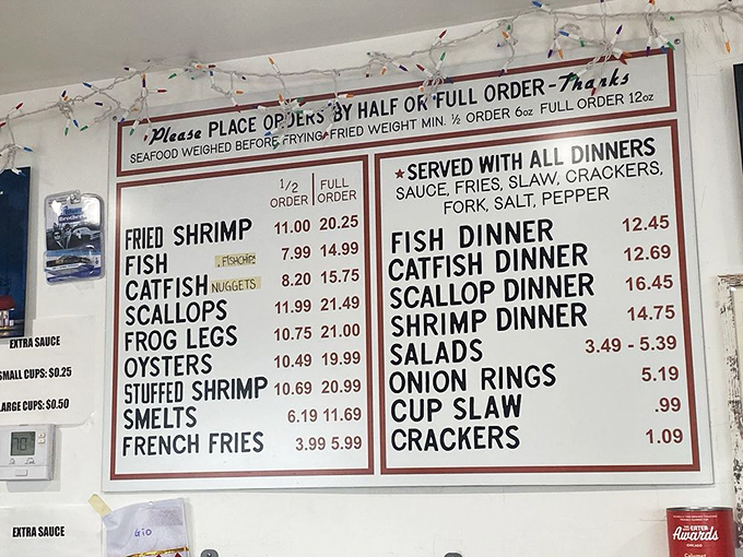 A menu board that reads like poetry to seafood lovers. From fried shrimp to smoked sturgeon, the options are straightforward but extraordinary.