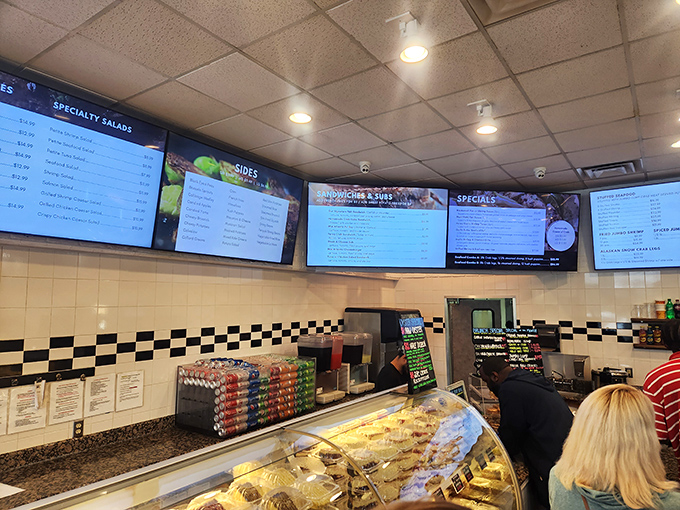 The menu boards tell a delicious story, each digital panel a chapter in your upcoming seafood adventure. Choose your own ending!