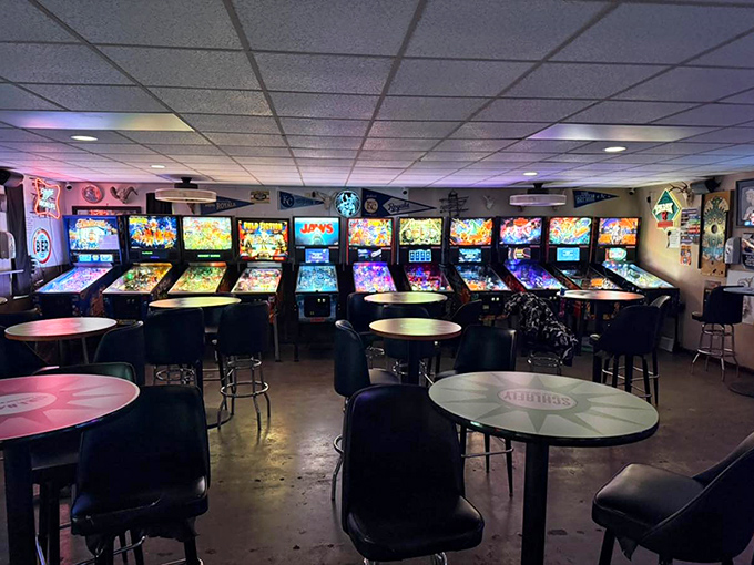 The perfect Friday night: cold drinks, warm conversation, and the satisfying thwack of flippers keeping dreams alive one quarter at a time.