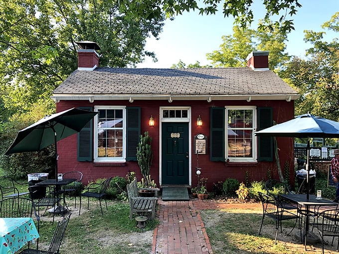 This cozy red cottage doesn't just serve food&mdash;it serves time travel with a side of charm that would make Norman Rockwell reach for his paintbrush.