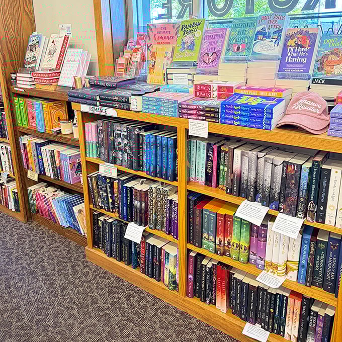The romance section: where bodice-rippers share shelf space with epic fantasies, proving love stories come in all dimensions and realities.