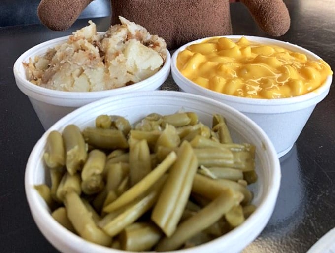 The holy trinity of sides: creamy mashed potatoes, mac and cheese that would make your grandma jealous, and green beans that taste like Sunday dinner.