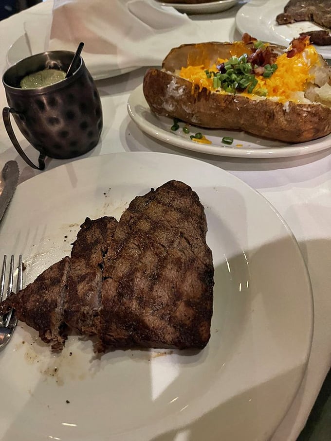 This perfectly seared steak alongside a loaded baked potato isn't just dinner&mdash;it's the reason people willingly drive for miles across Oklahoma.