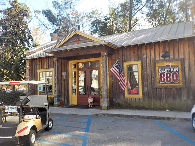 Bluffton BBQ's rustic wooden exterior promises the kind of meal that requires both napkins and possibly a nap afterward.