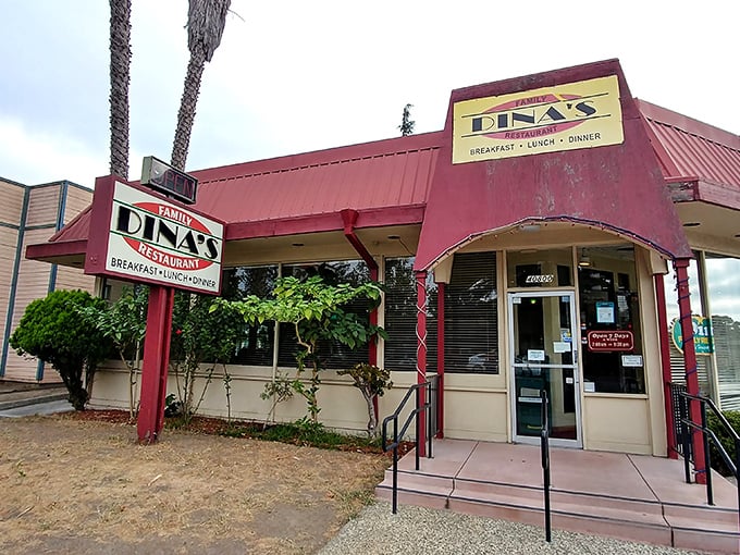 Dina's Family Restaurant: That red roof and yellow sign? Nature's way of saying "Hungry humans, turn here for happiness served on a plate."