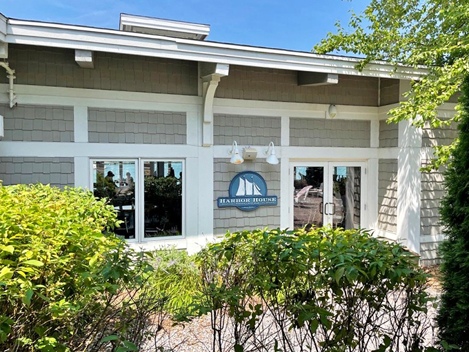 Harbor House front entrance: Understated elegance with bushes that say "we're fancy, but not too fancy." The kind of place where seafood comes with a view.