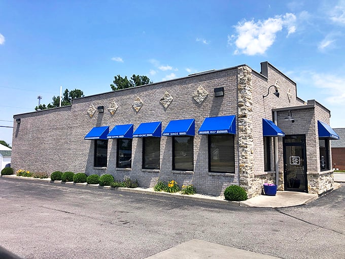 Louie's stone fa&ccedil;ade and blue awnings might look upscale, but inside awaits the beautifully democratic pleasure of perfect Coney Island dogs.
