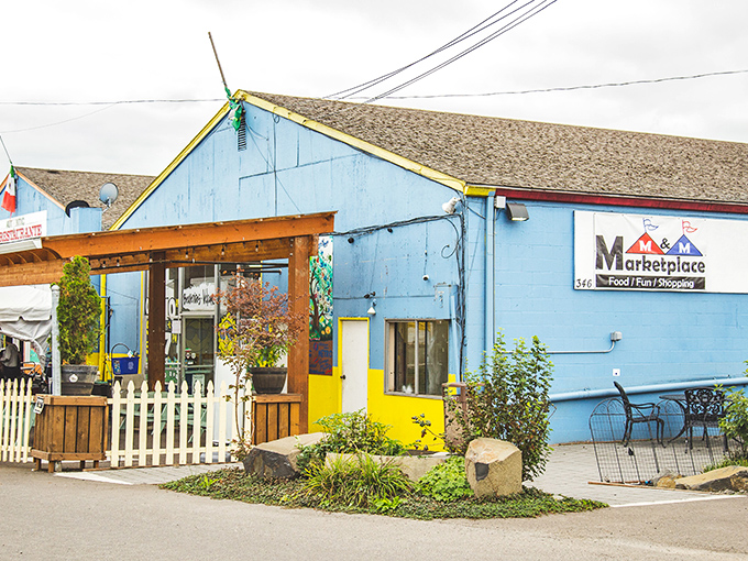 M&M Marketplace's cheerful blue exterior hints at the vibrant cultural kaleidoscope waiting inside&mdash;a passport-free international adventure.