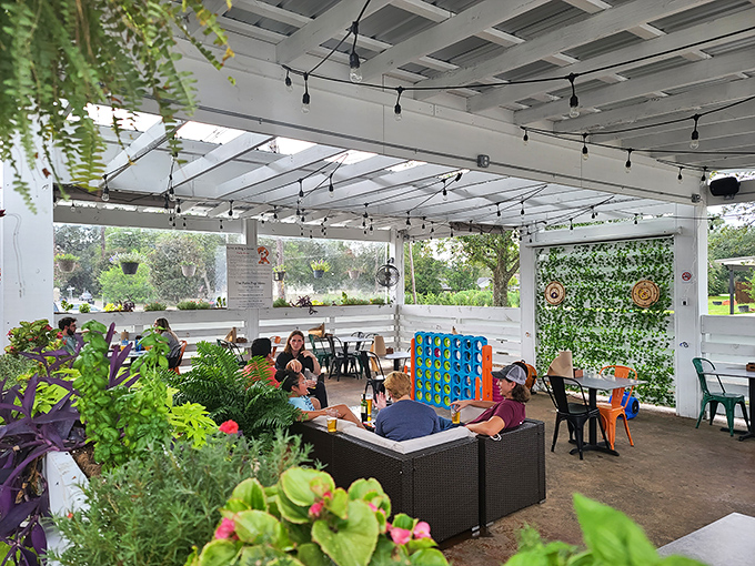 Milan's outdoor oasis proves that pizza tastes better under string lights with a Connect Four challenge on the side.