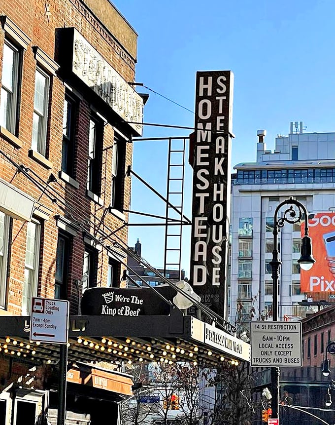 Old Homestead's iconic vertical sign&mdash;a meat lighthouse guiding hungry souls through the Meatpacking District since before Instagram was a thing.