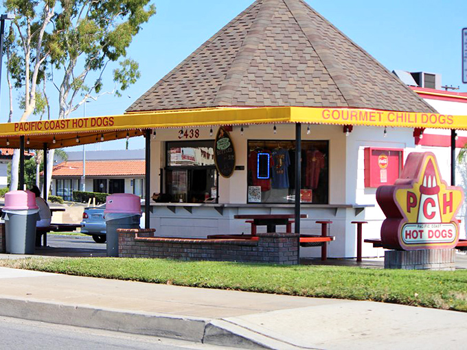 Pacific Coast Hot Dogs' distinctive pyramid roof houses hot dog royalty beneath its quirky crown.