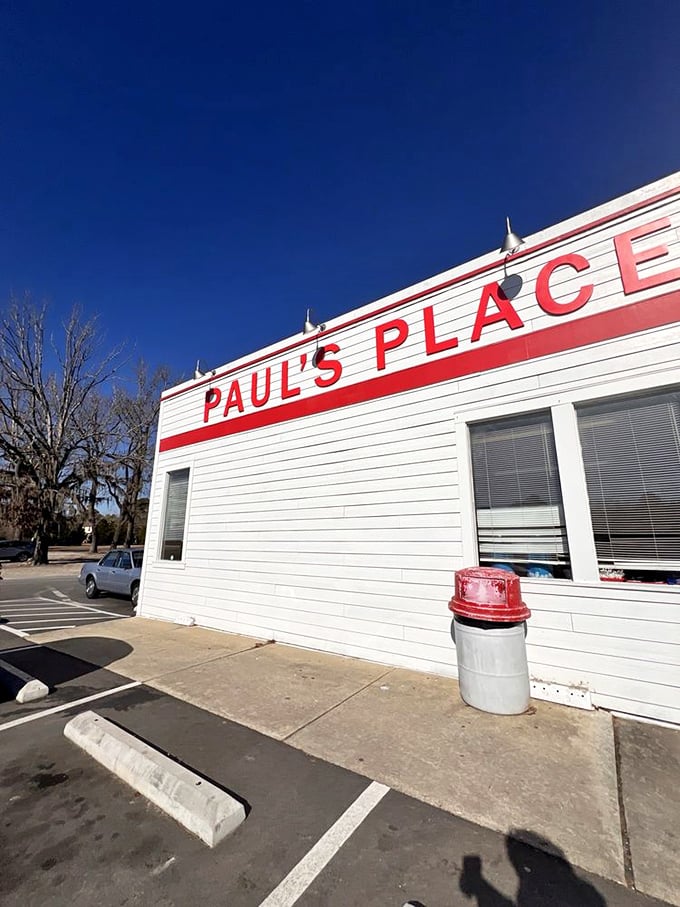 Paul's Place stands like a white-walled time capsule, preserving the sacred art of hot dog perfection for almost a century.