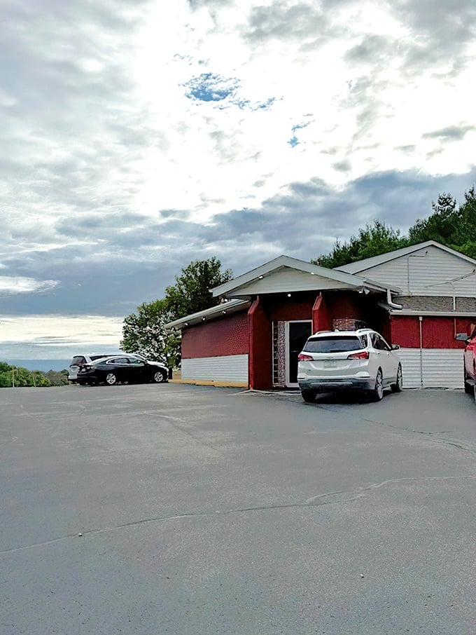 The Redwood's modest roadside presence belies what locals know: this is where beef dreams come true under Iowa skies.