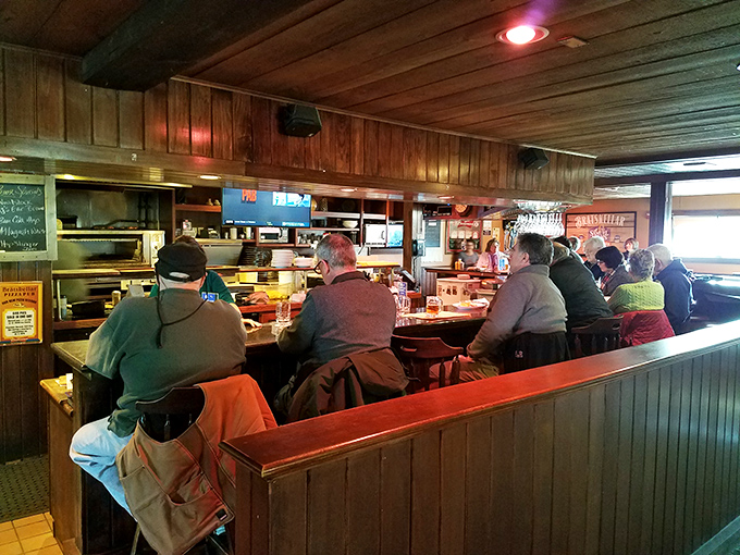 Where locals escape to enjoy no-nonsense pizza perfection while tourists wander elsewhere. Their loss, your gain.