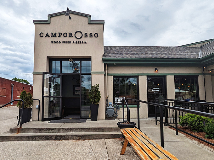 Camporosso: Clean lines, warm welcome. This isn't just a restaurant entrance &ndash; it's a portal to Naples that conveniently doesn't require a passport.