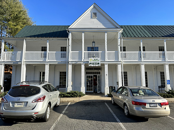 The white-columned porch invites you to sit a spell before diving into sourdough creations that redefine "Southern comfort."