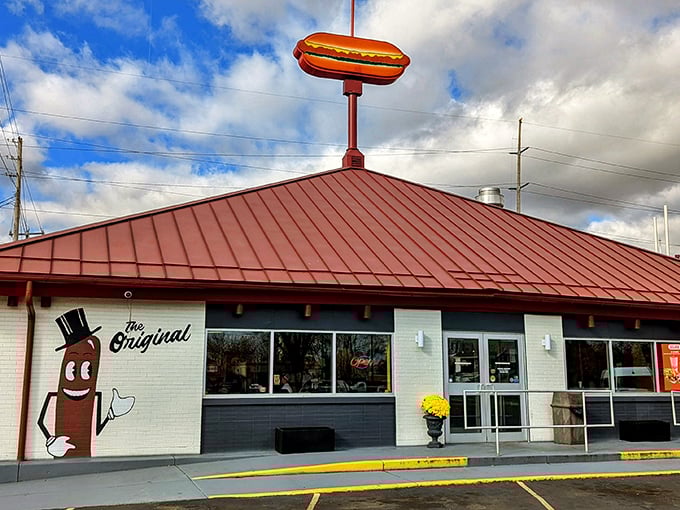 That iconic hot dog sign isn't just advertising &ndash; it's a promise of snap, sizzle, and satisfaction that Warren residents treasure.