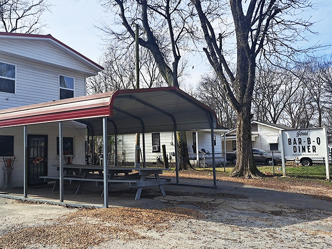 The picnic table outside Jones' isn't just seating&mdash;it's a front-row ticket to one of America's most authentic barbecue experiences.