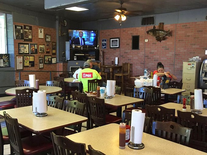 Simple tables, decades of history, and the unmistakable orange glow that says, "You're about to have the meal of your life."