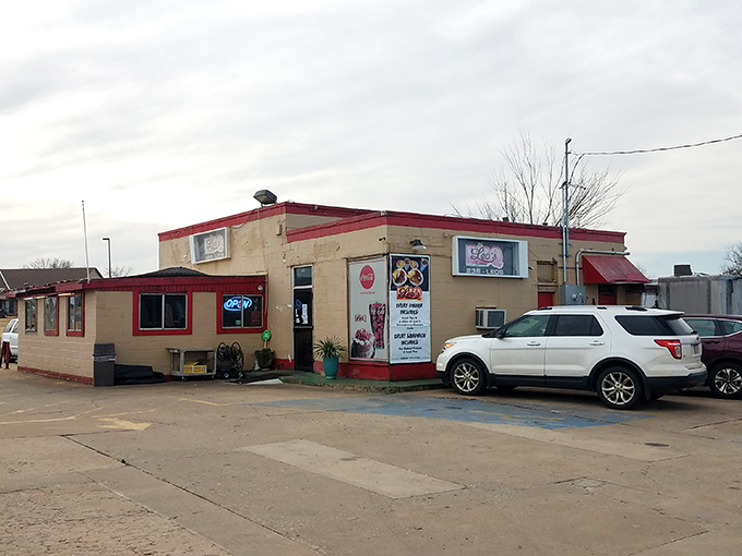 That simple tan building with red trim? It's like finding out your quiet neighbor is secretly a barbecue superhero.