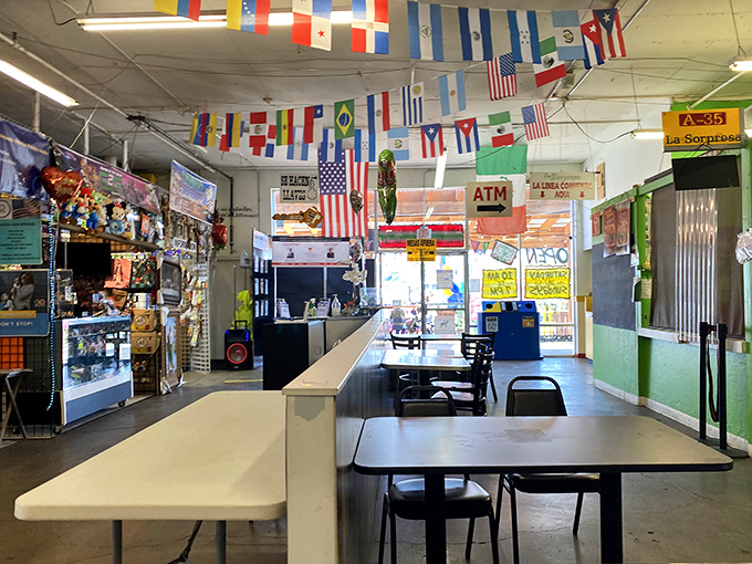 Flags from around the world hang proudly above M&M's bustling aisles, where global cuisines and crafts converge in colorful harmony.