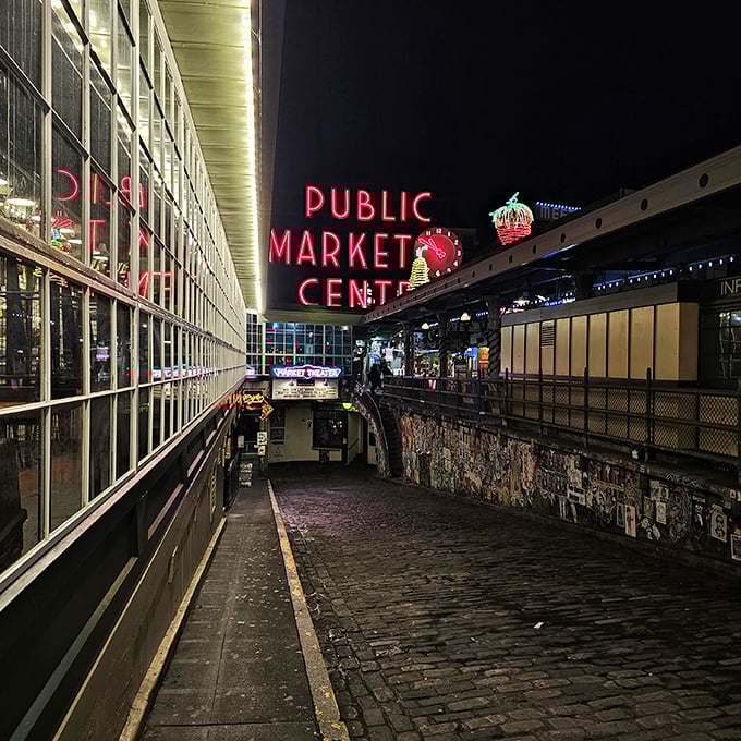 The neon-lit cathedral of seafood at Pike Place. No Seattle visit is complete without witnessing this maritime spectacle.