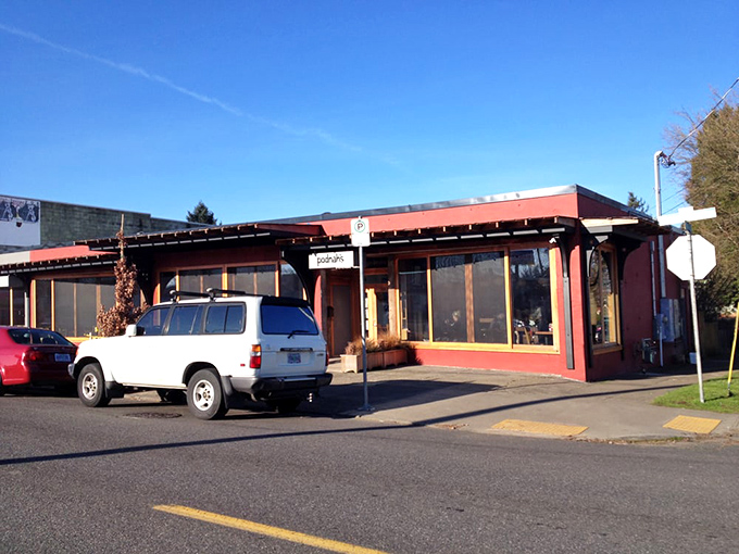 Rain or shine, this BBQ joint's bold red letters promise salvation for empty stomachs. The smoke signals are calling!