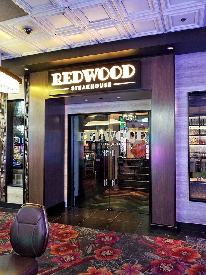 The warm wood tones and subtle lighting say "fine dining," but the steaks say "life-changing experience worth every penny."