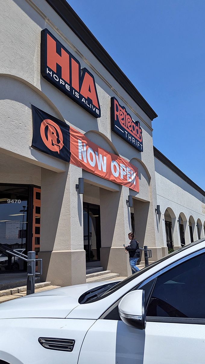 Just opened and already looking spectacular! This thrift store's banner promises stories behind every secondhand find.