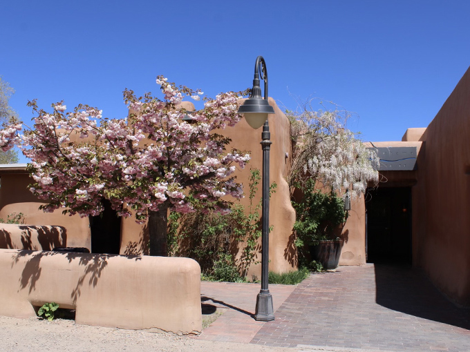 Behind Rio Chama's unassuming adobe walls lies a steakhouse sanctuary bathed in New Mexico's golden light.